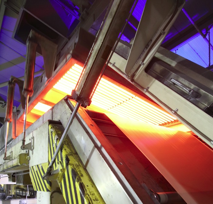 Infrared heat for adhesives